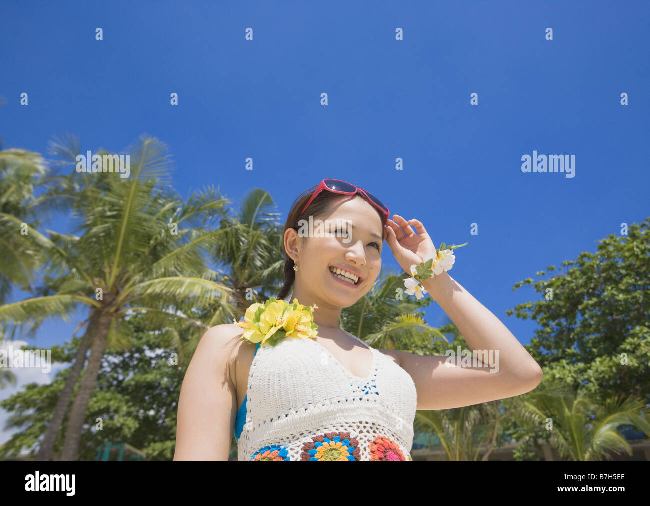 Woman and blue sky Stock Photo - Alamy