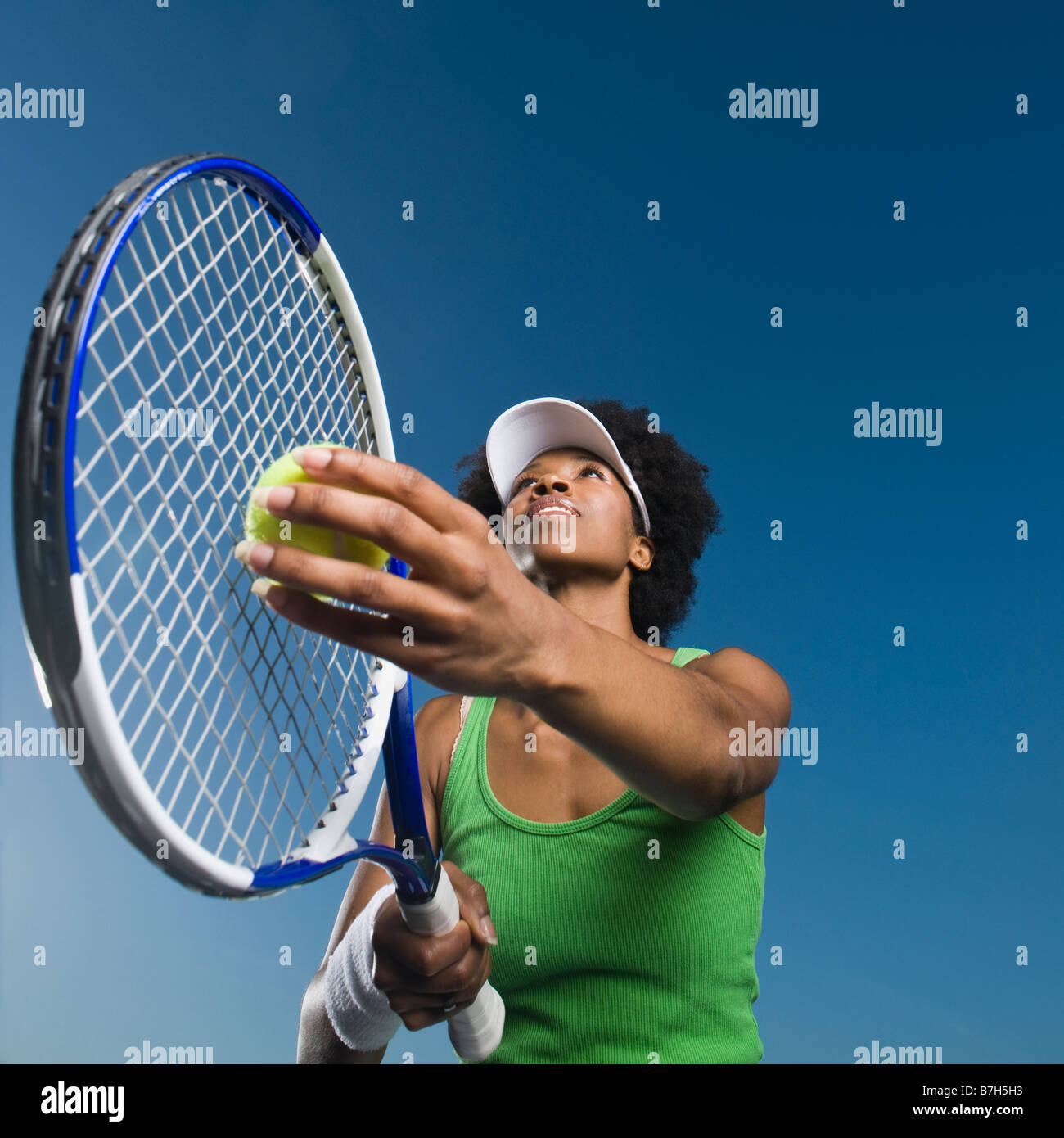 African woman playing tennis Stock Photo - Alamy