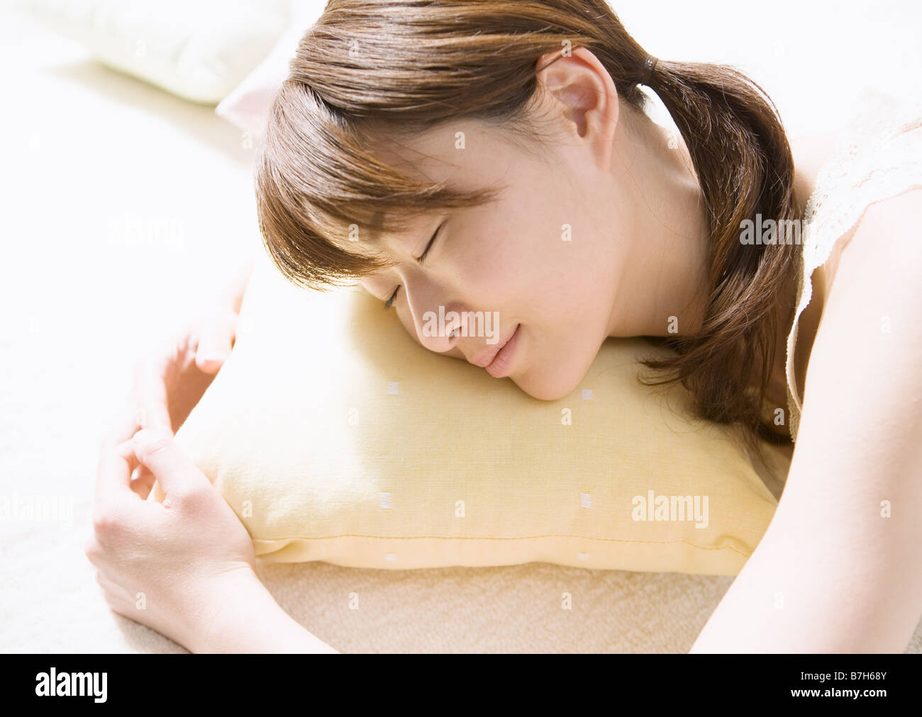 Young Woman Taking a nap Stock Photo - Alamy