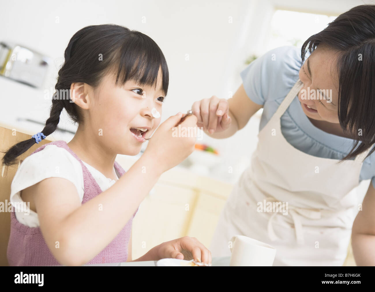 Girl Eating Snacks Stock Photo - Alamy