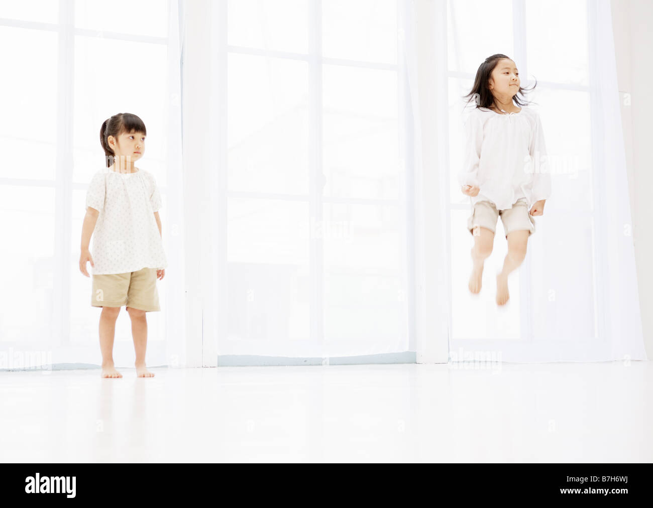 Sisters Having Fun Stock Photo - Alamy