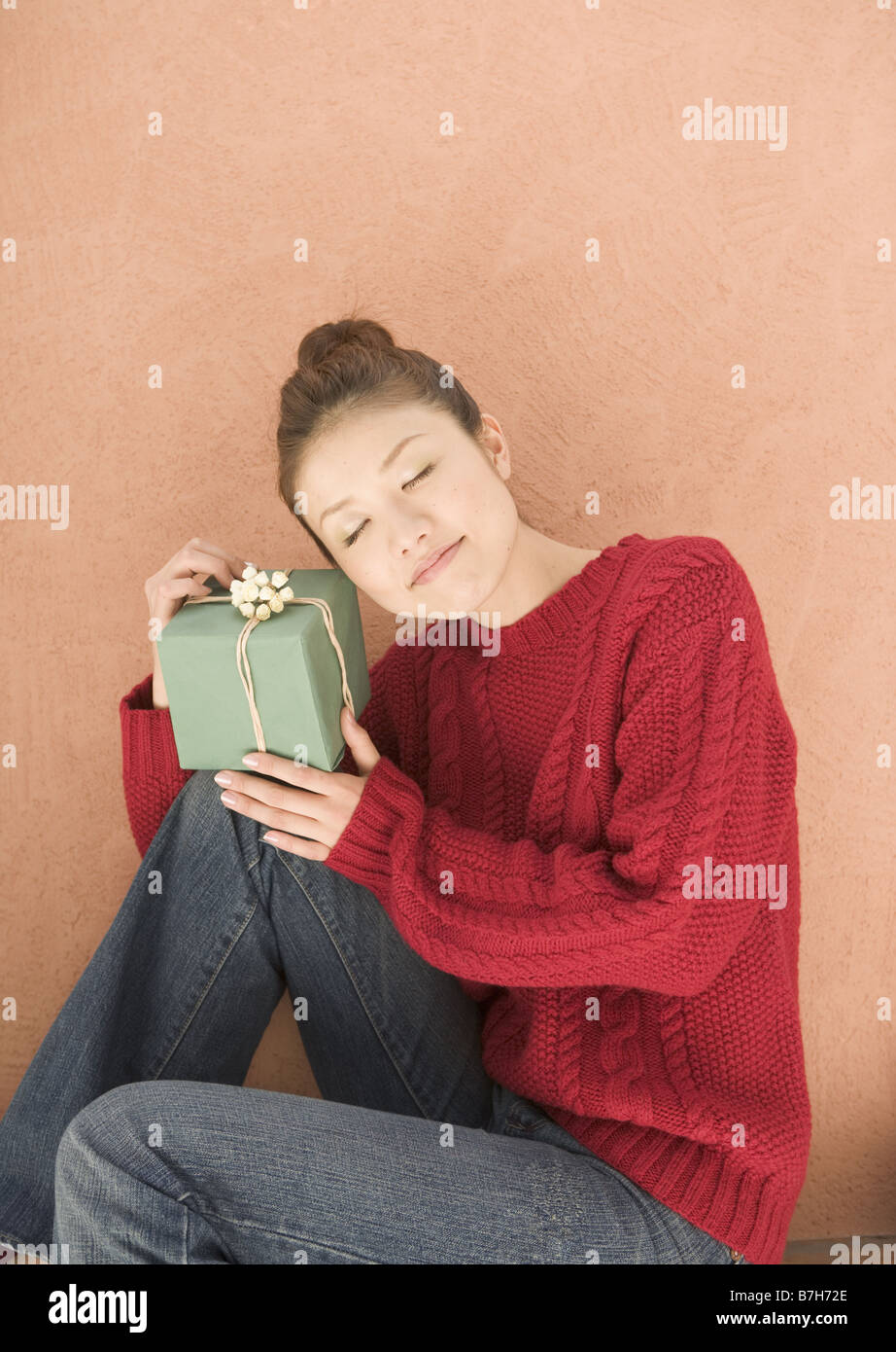 Woman Holding Present Stock Photo - Alamy