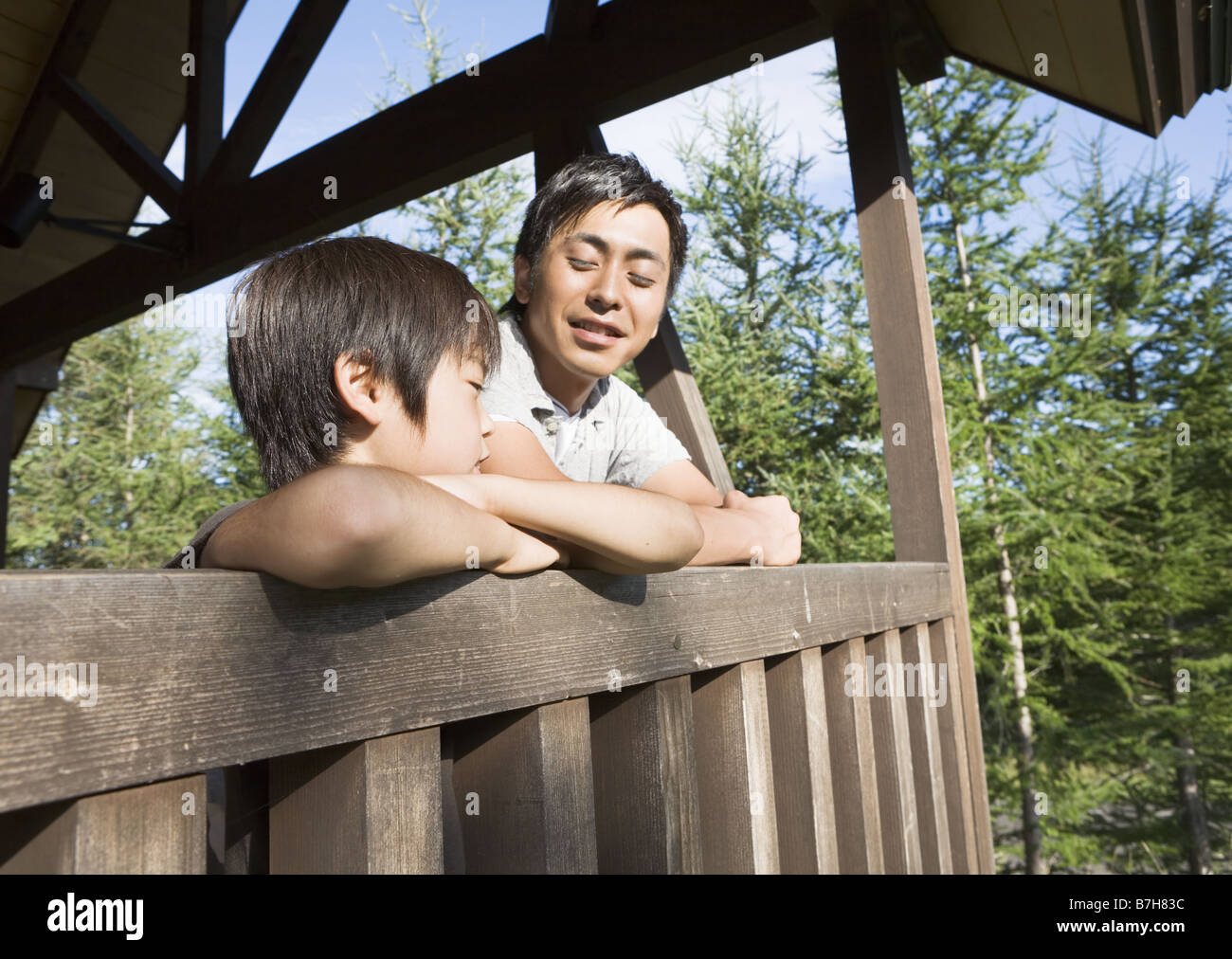 Father and son talking Stock Photo - Alamy