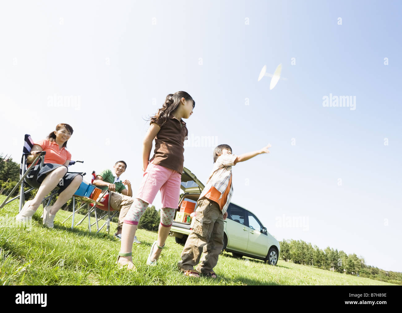 Children playing with toy plane Stock Photo - Alamy