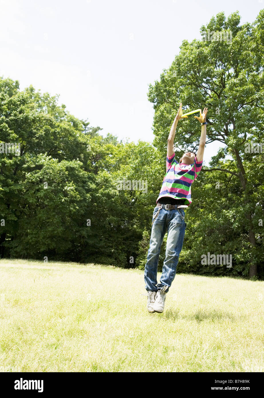 Man and frisbee and front view hi-res stock photography and images - Alamy