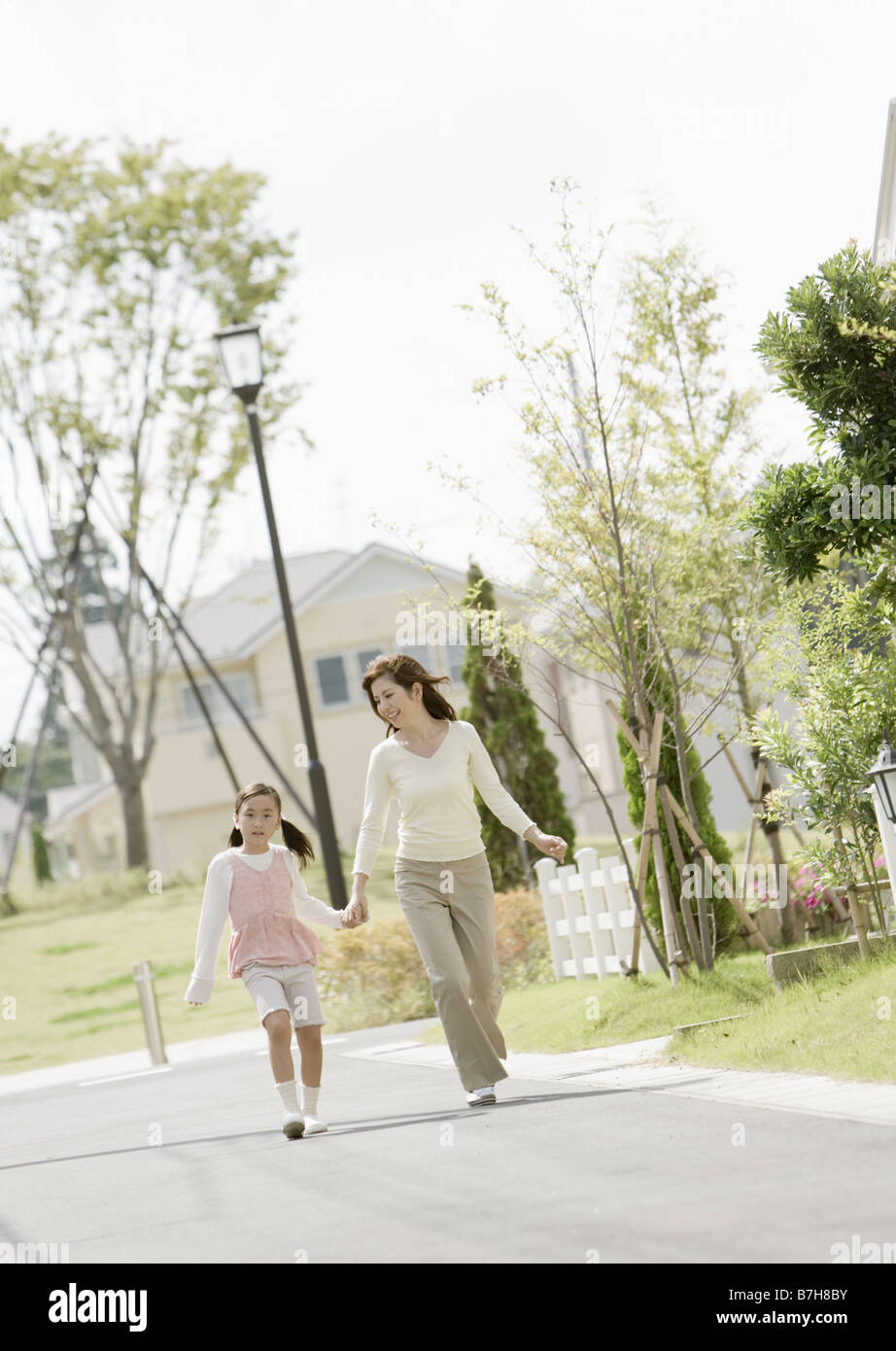 Mother and daughter taking a walk Stock Photo - Alamy