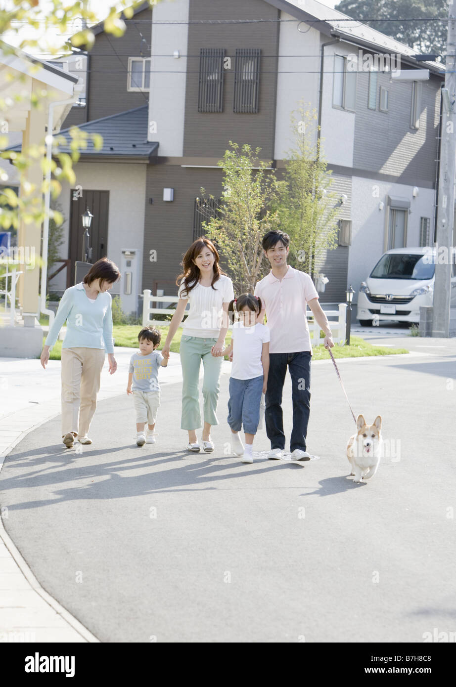 Family taking a walk Stock Photo - Alamy