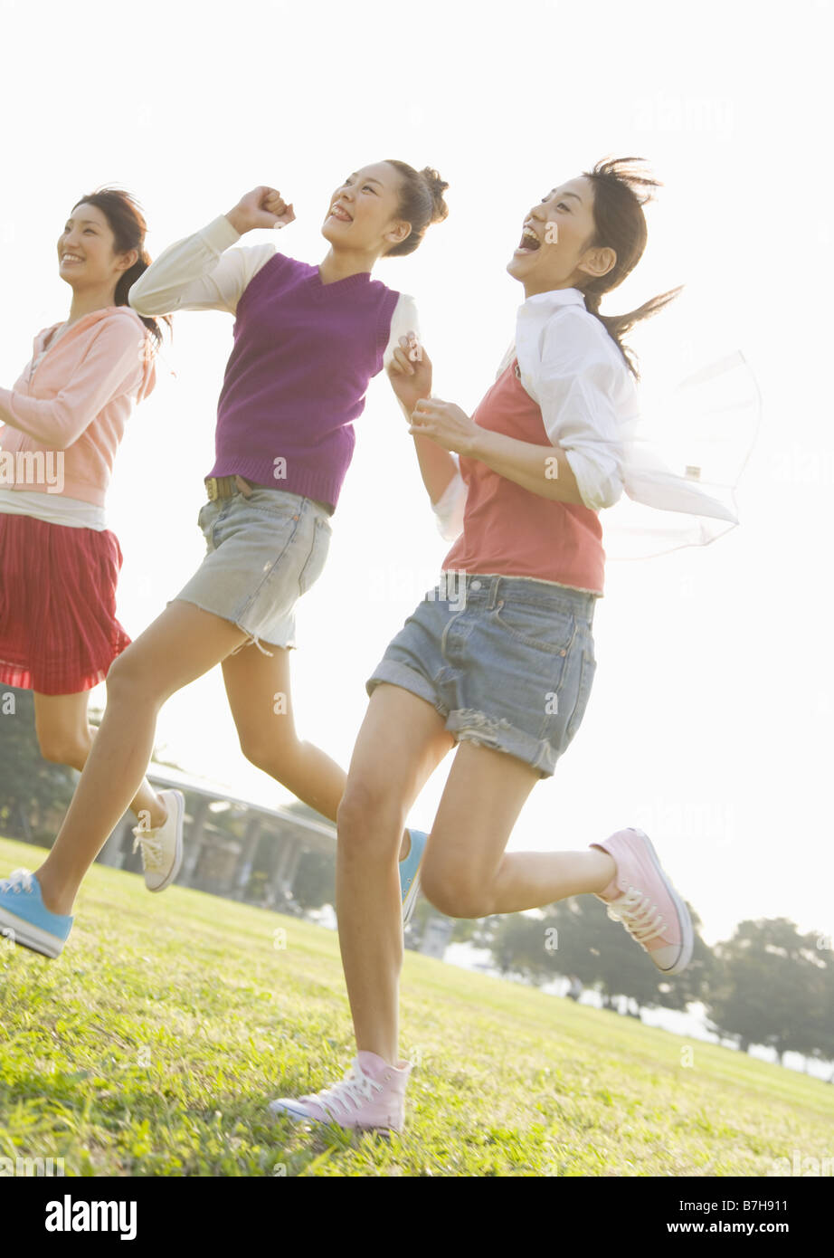 Women running in the park Stock Photo - Alamy