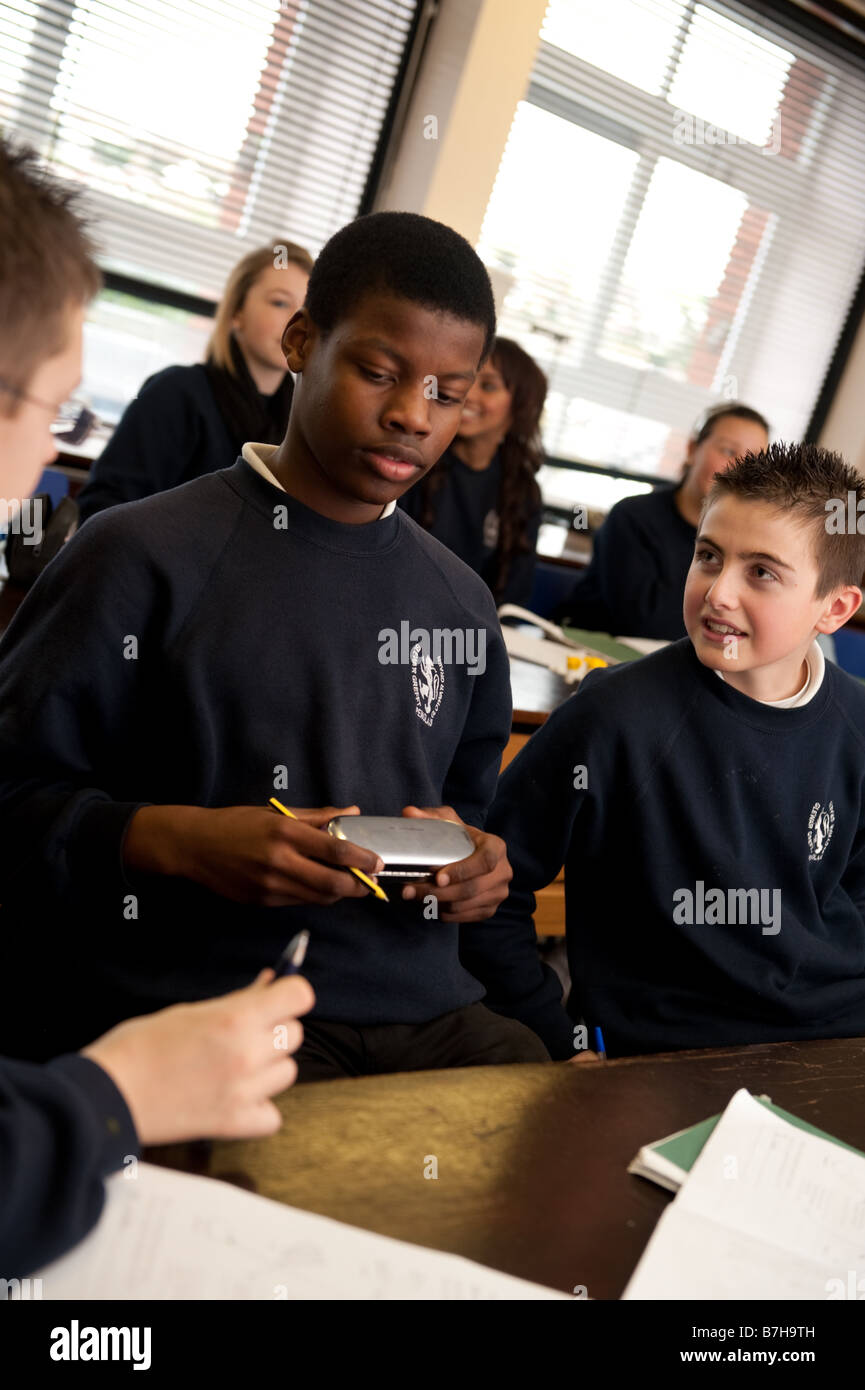 young teenage Year 9 pupils in a lesson in a classroom at Penglais ...