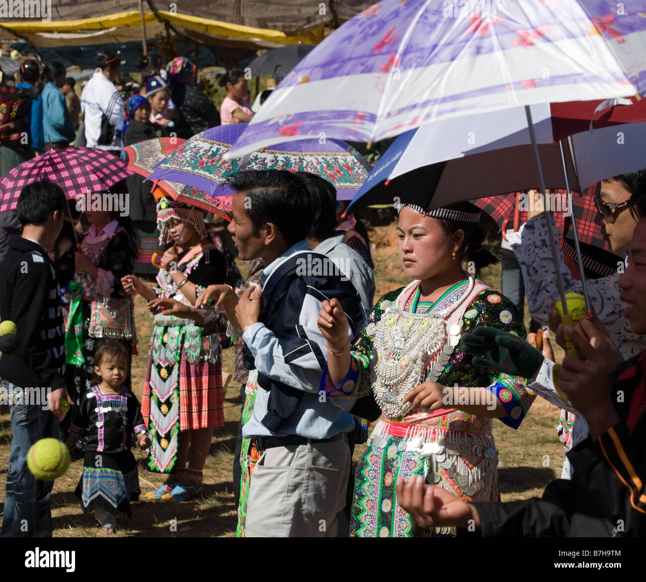 Hmong lined up playing the ball game a traditional Hmong New Year ...