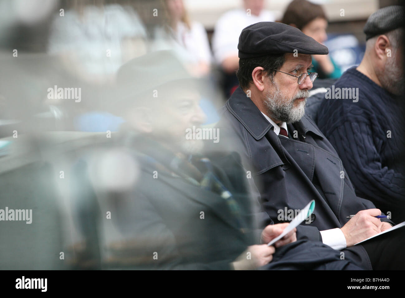 crowds and holocaust survivors watching speeches during the holocaust ...