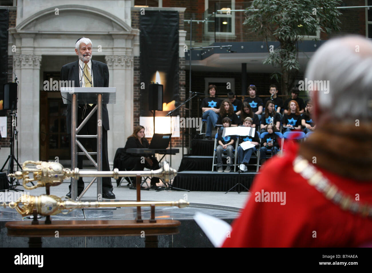 Holocaust survivor Jack Kagan giving a speech at the holocaust memrial ...