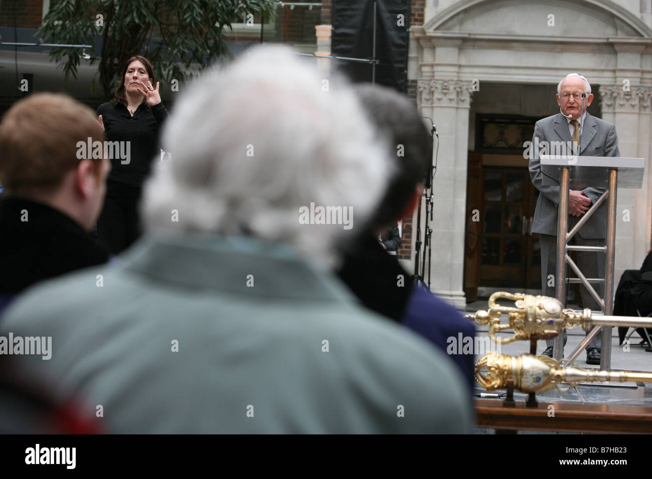 Holocaust survivor Jack Kagan giving a speech at the holocaust memrial ...