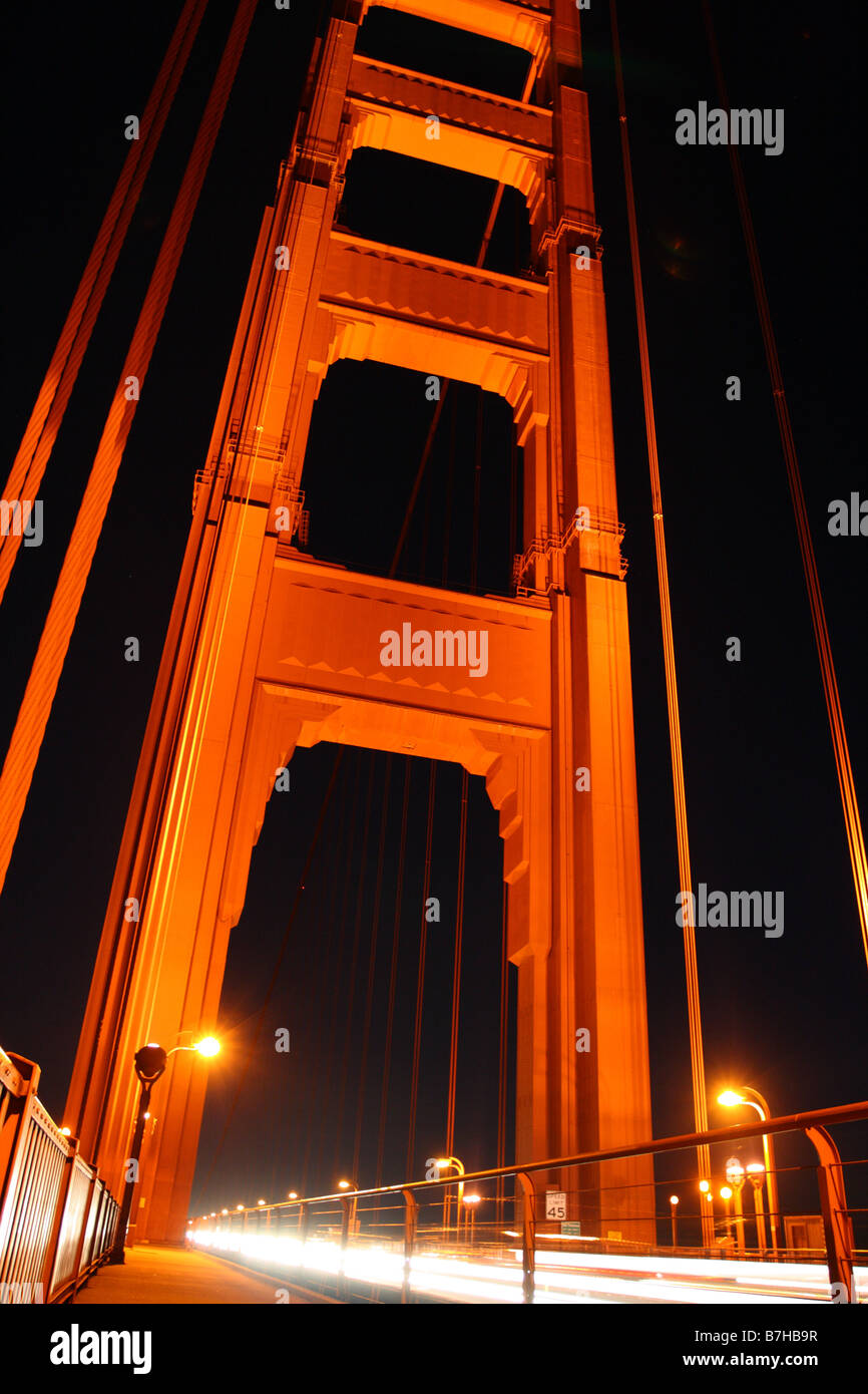 Traffic headlights create light trails on Golden Gate Bridge at San ...