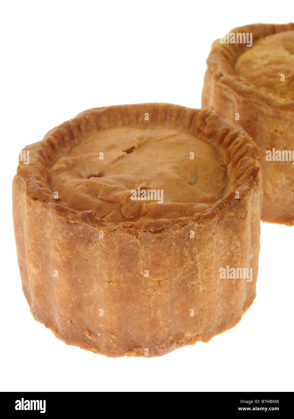 Fresh Individual Pork Pies In A Pastry Crust Isolated Against A White ...
