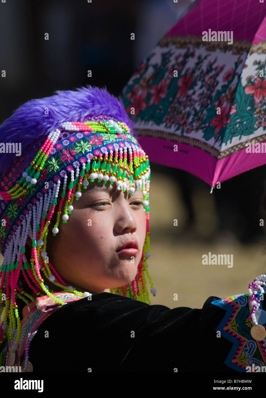 A Hmong girl in traditional costume at a Hmong New Year celebration at ...
