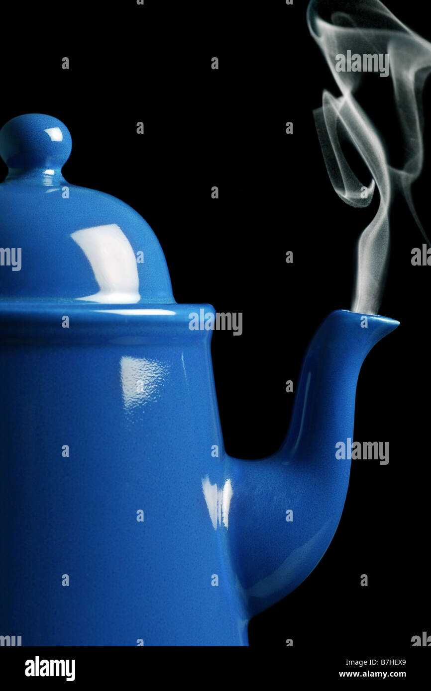 blue teapot with steaming spout Stock Photo - Alamy