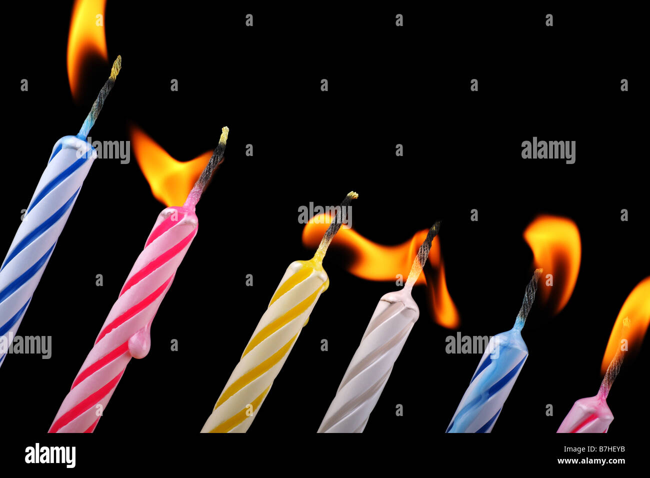 Six burning birthday candles hi-res stock photography and images - Alamy