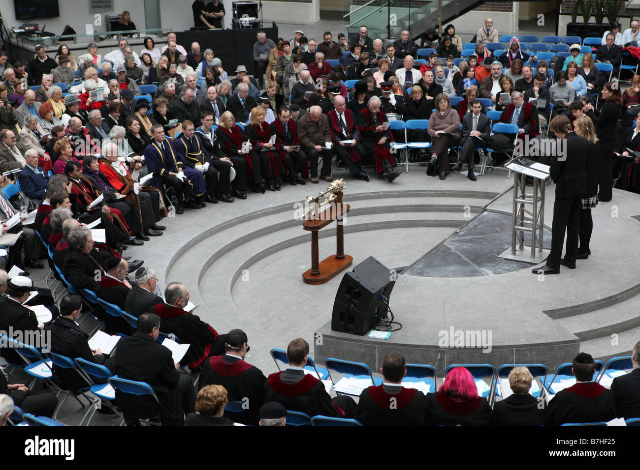 crowds and holocaust survivors watching speeches during the holocaust ...