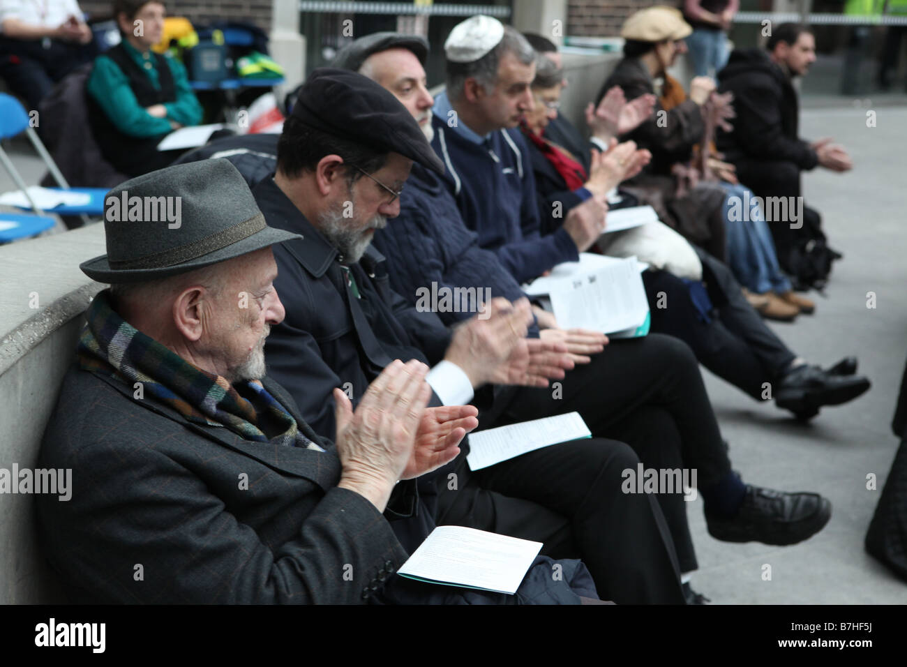 crowds and holocaust survivors watching speeches during the holocaust ...