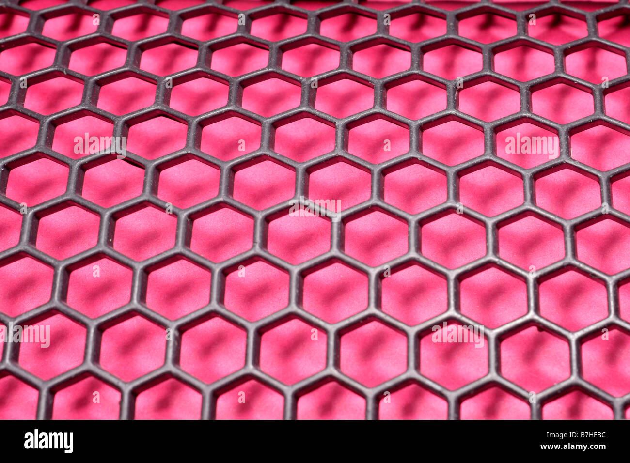Red honeycomb hi-res stock photography and images - Alamy