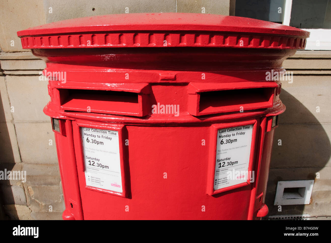 Twin mouth large pillarbox red post box in Britain Stock Photo - Alamy