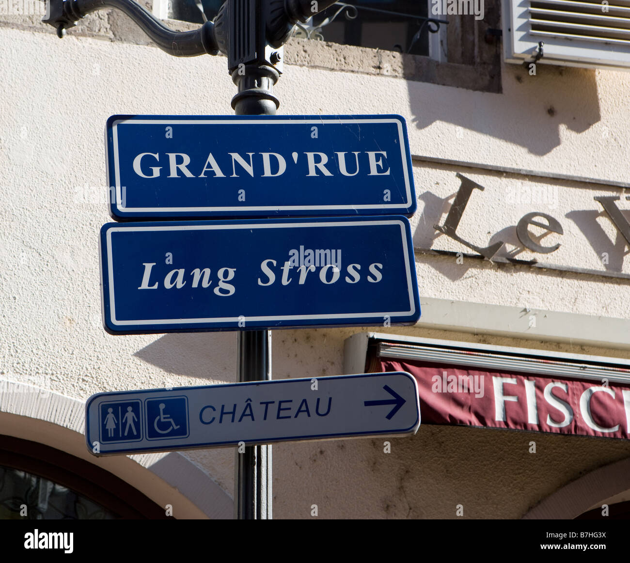 A lot of street signs in the languages german and french here the Grand ...