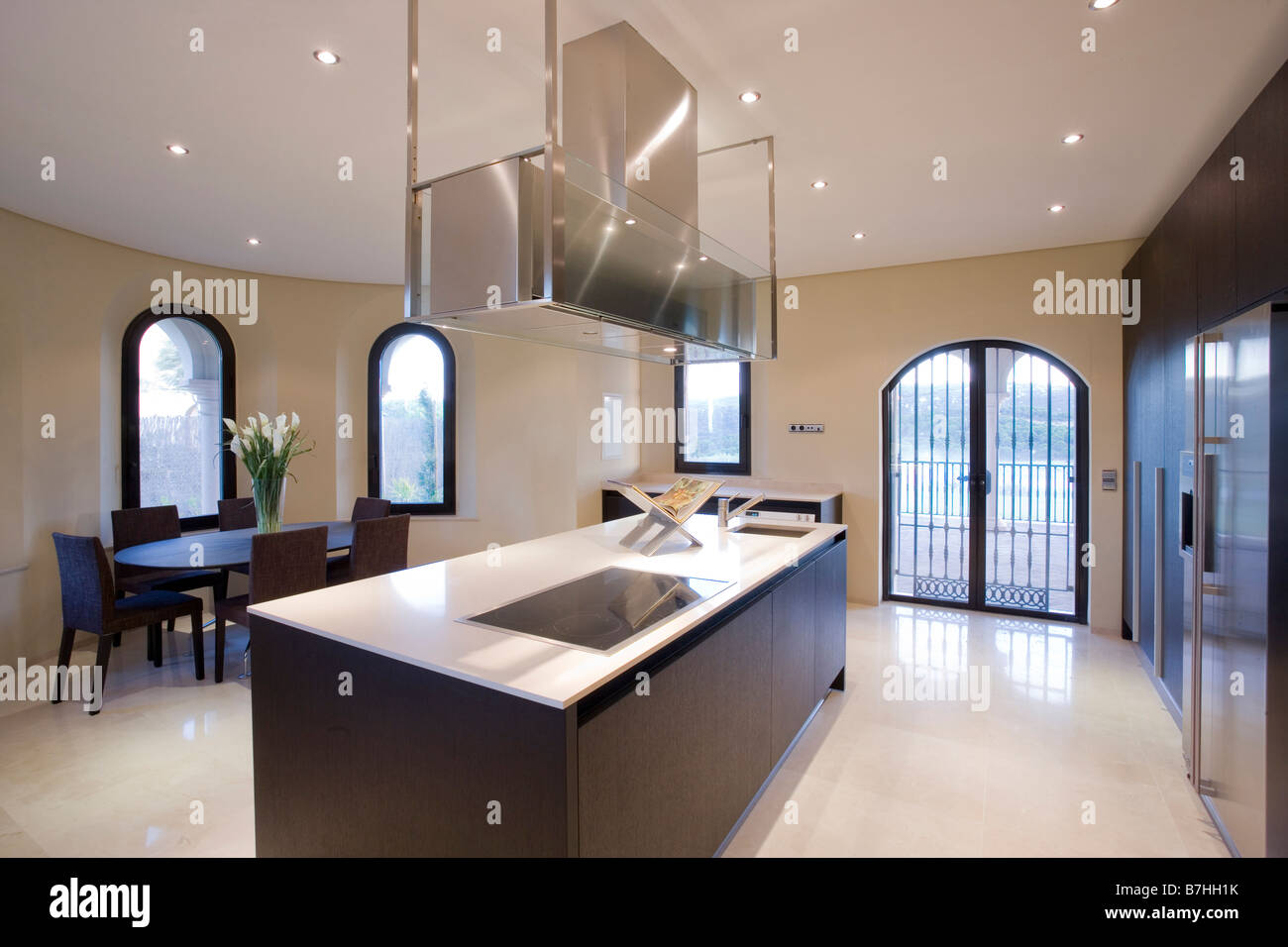 Island unit in modern kitchen dining room in apartment at the Mclundie ...