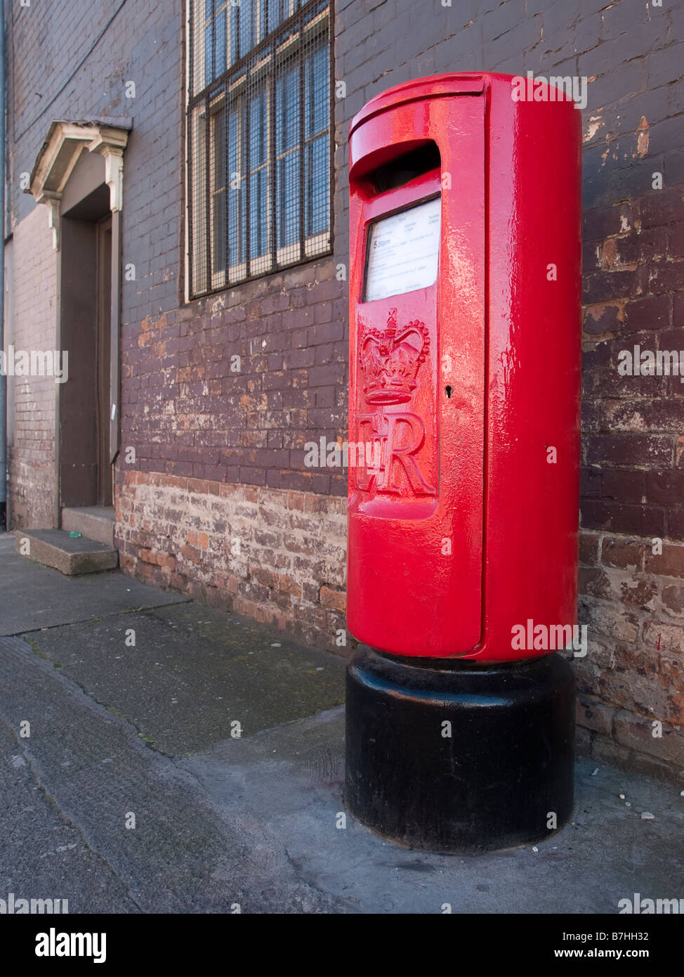 a modern pillar-box on a street corner in Worcester Stock Photo - Alamy
