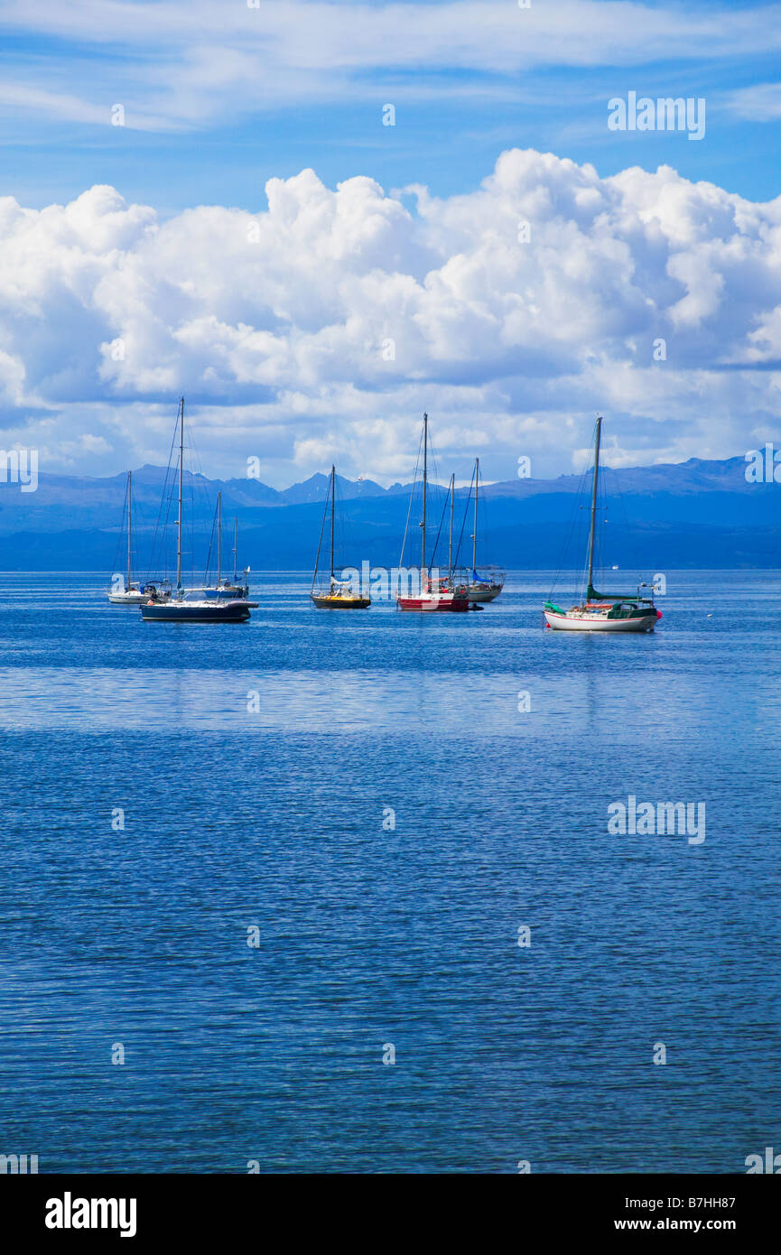 Clouds over sail boats in the ocean Ushuaia Argentina Stock Photo - Alamy