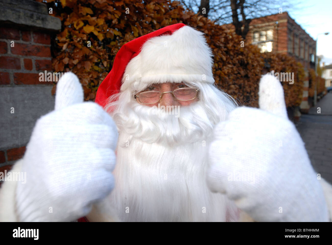 Father Christmas gives the thumbs up UK Stock Photo - Alamy