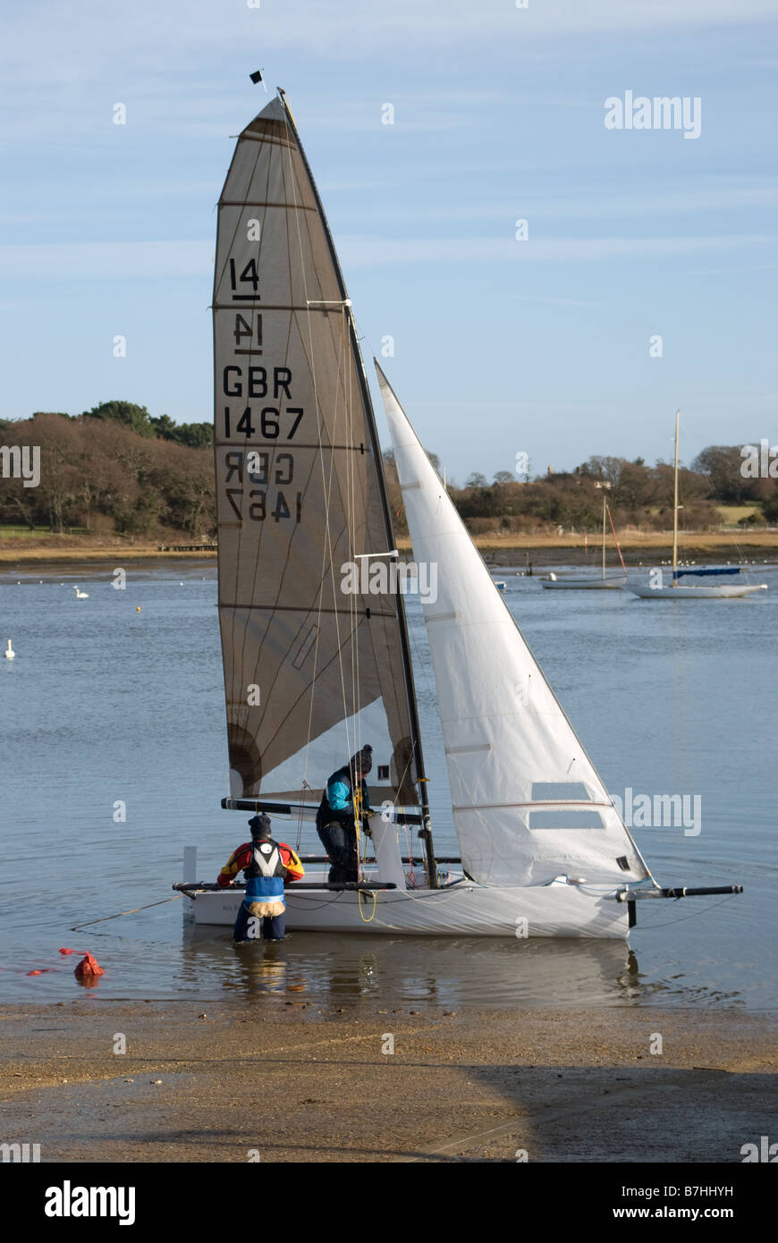 Getting Dingy ready to sail Stock Photo - Alamy