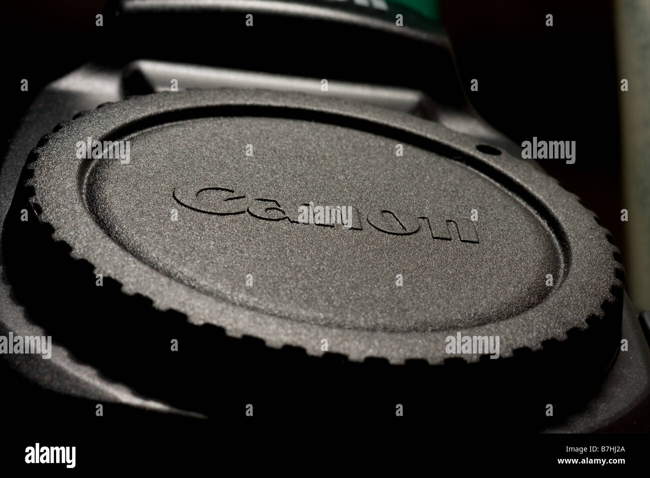 Canon camera body cap on SLR with Canon logo Stock Photo - Alamy