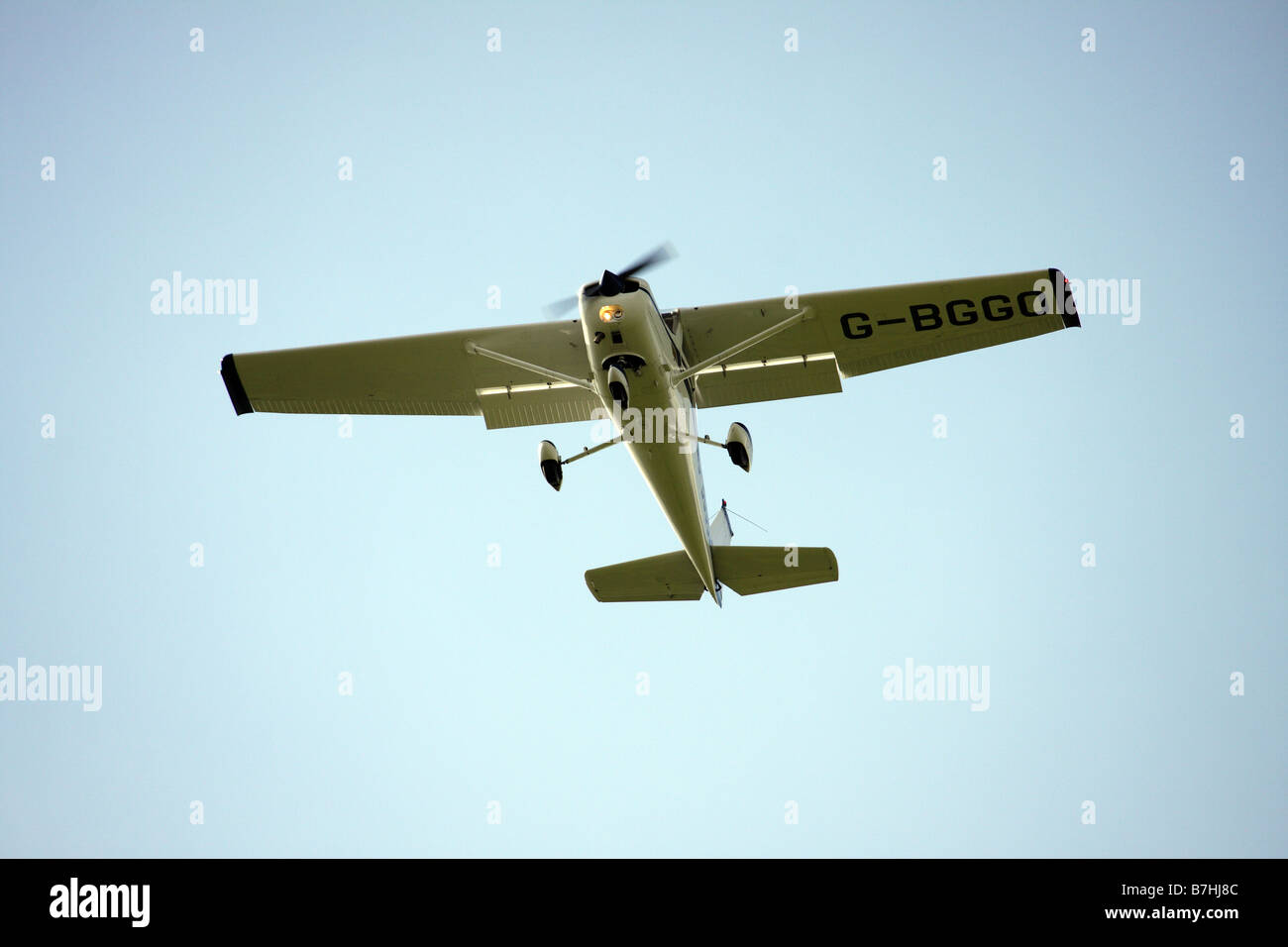 A photograph of a small plane coming in to land at a local airport ...
