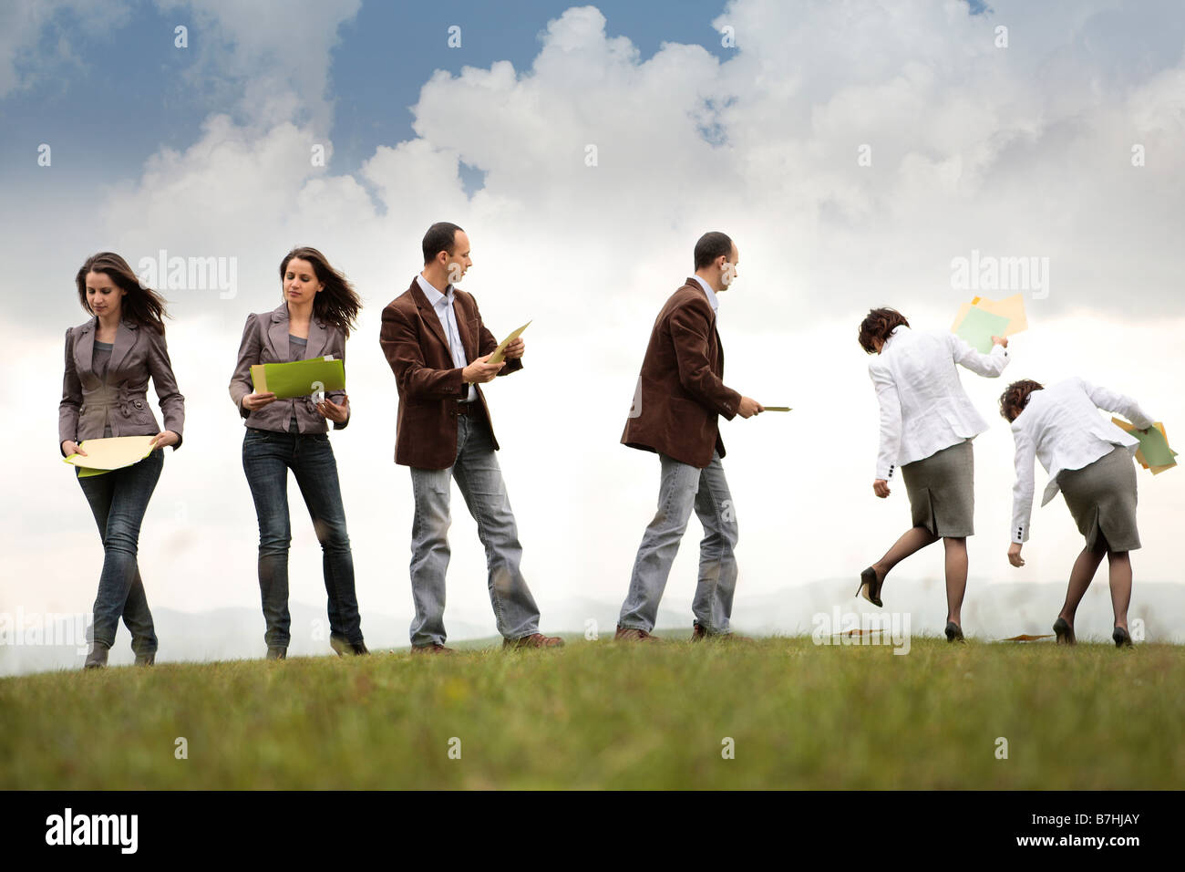 Team of busy business people on the move Stock Photo - Alamy