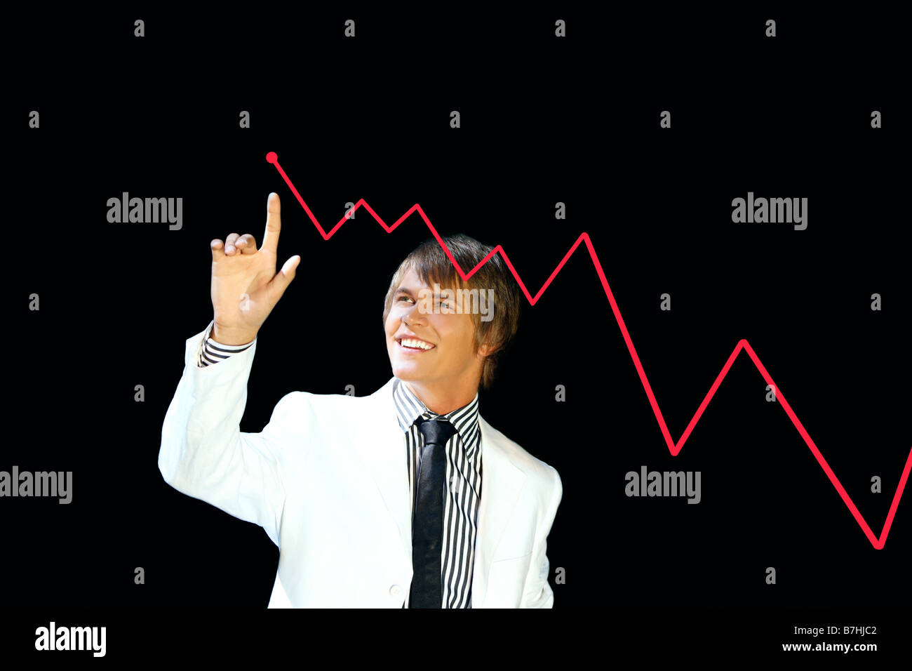 young business man pointing to a chart isolated on black Stock Photo ...