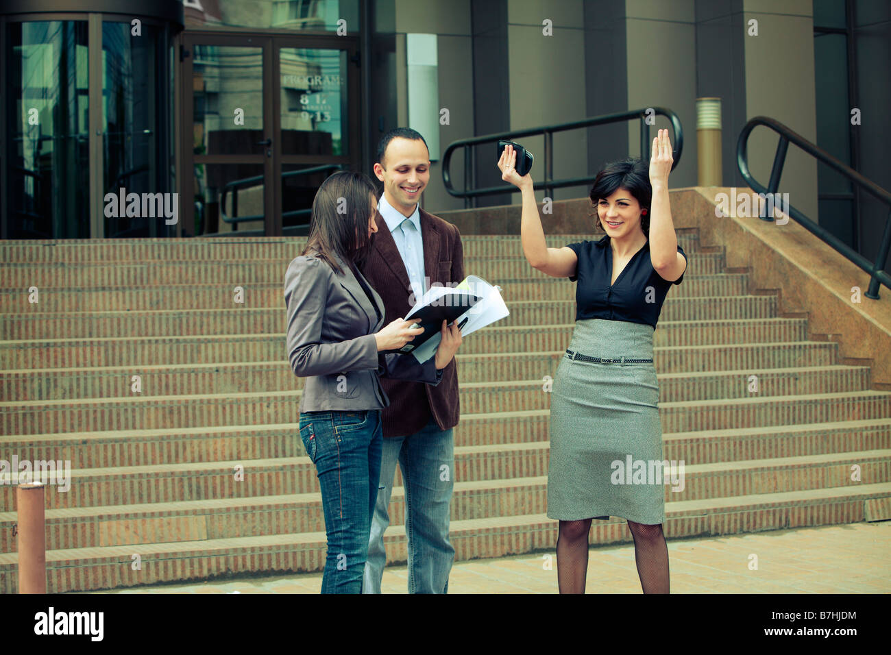 Business people talking with a happy client after a deal Stock Photo ...