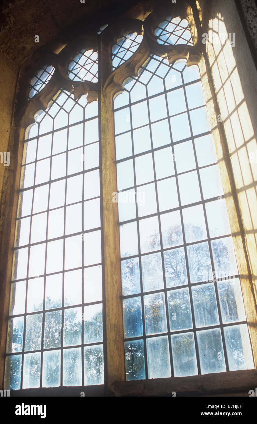 Plain square and diamond leaded windows in Early English Gothic style ...