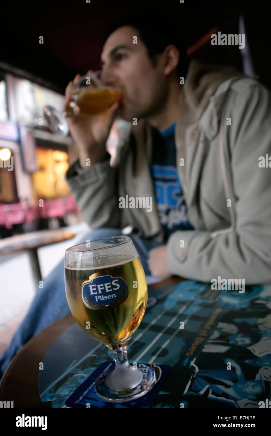 Turkish man drinking Efes beer in Taksim Istanbul Turkey Stock Photo ...
