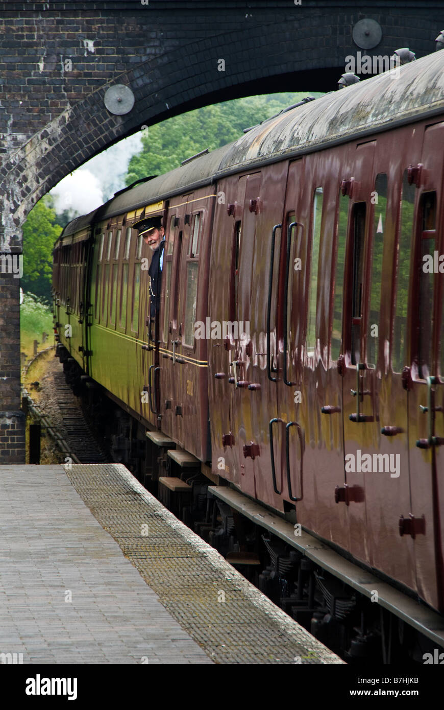 A steam train leaves Weybourne station on the Poppy Line in Norfolk ...