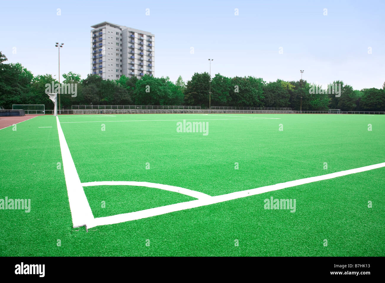 Football pitch with high rise Stock Photo - Alamy