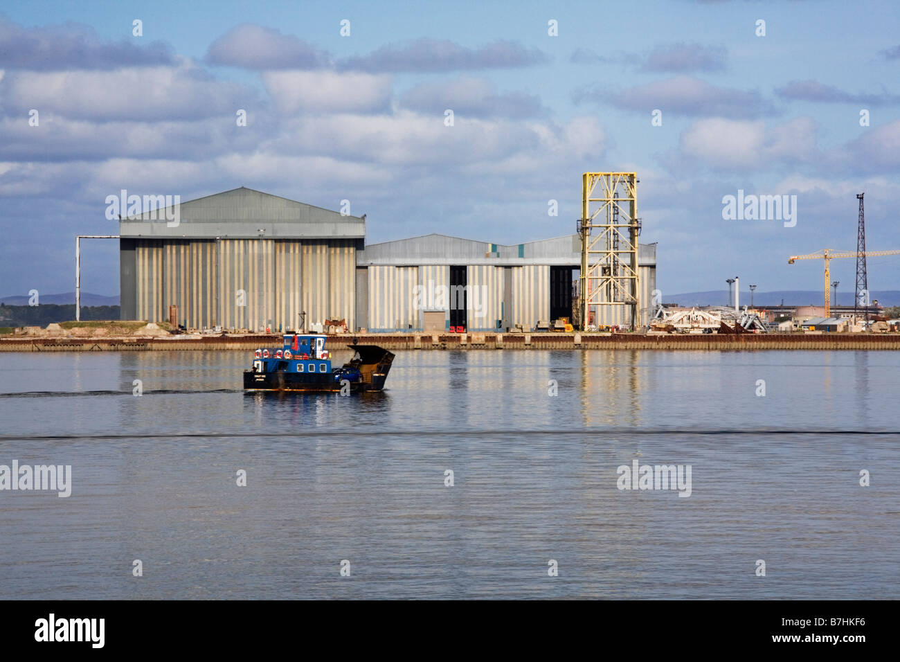 The Nigg Bay car ferry crossing the Cromarty Firth with the oil rig ...