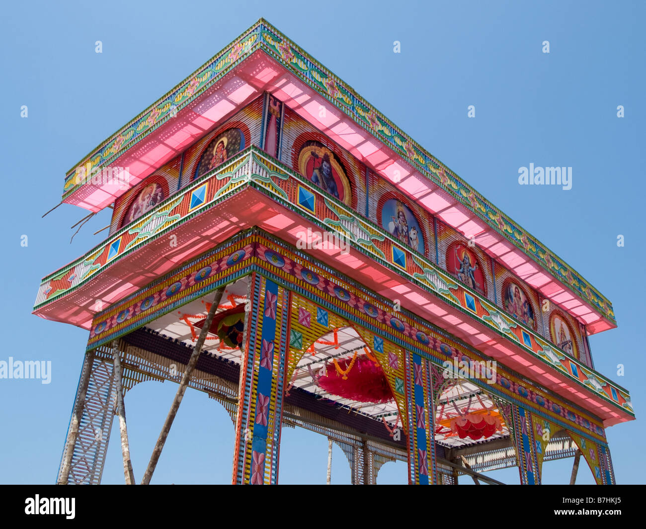 a temporary canopy forms a decorative entrance to an Indian Hindu ...