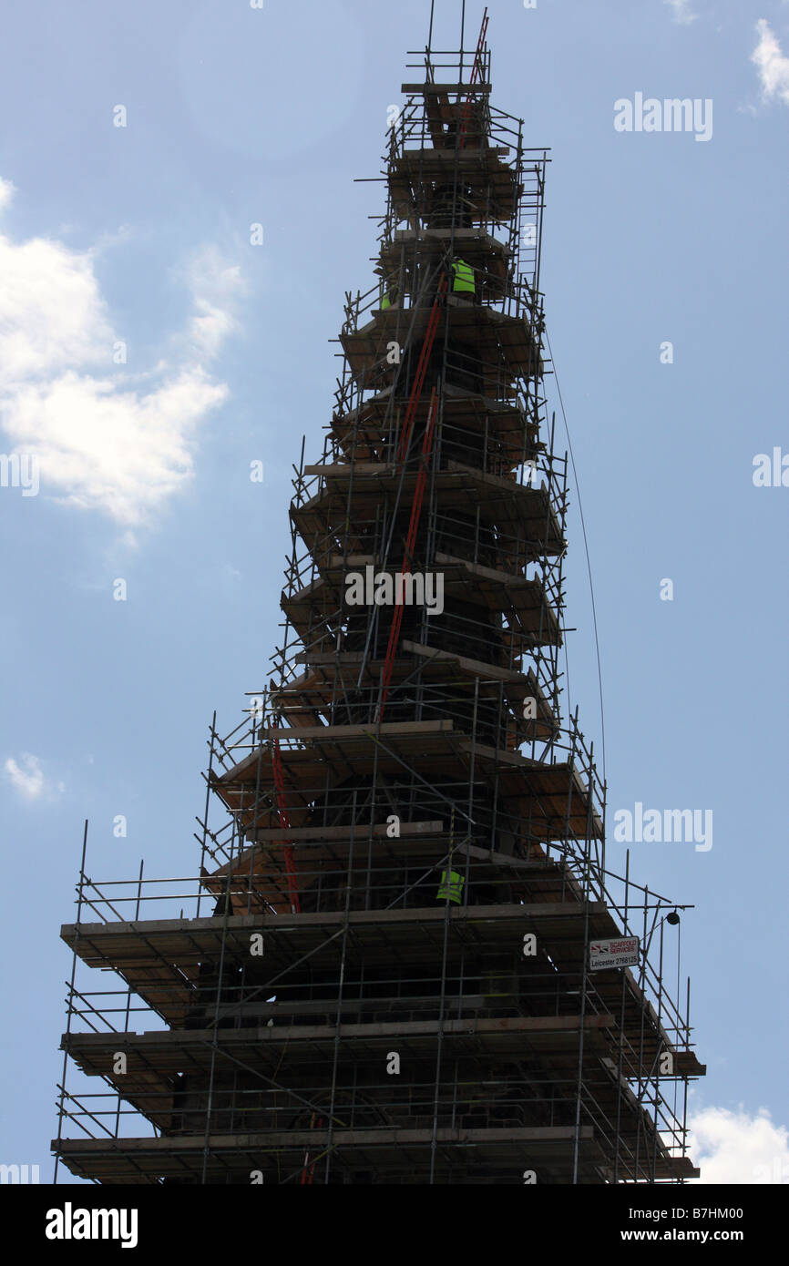 A photograph showing the construction industry where working men are ...