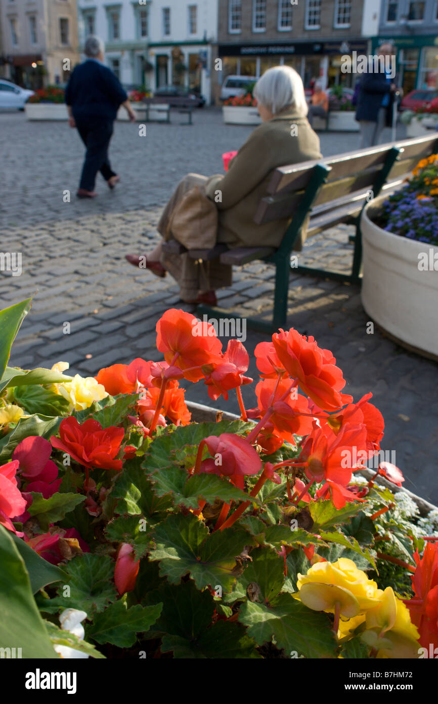 Relaxing in Kelso town square Scotland on a late summer day Stock Photo ...