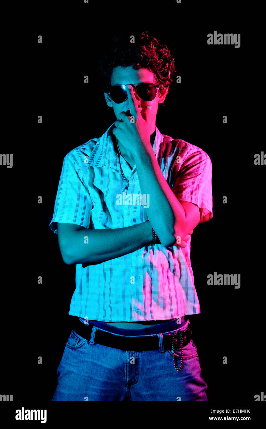 Portrait of young cool male model posing with attitude Stock Photo - Alamy