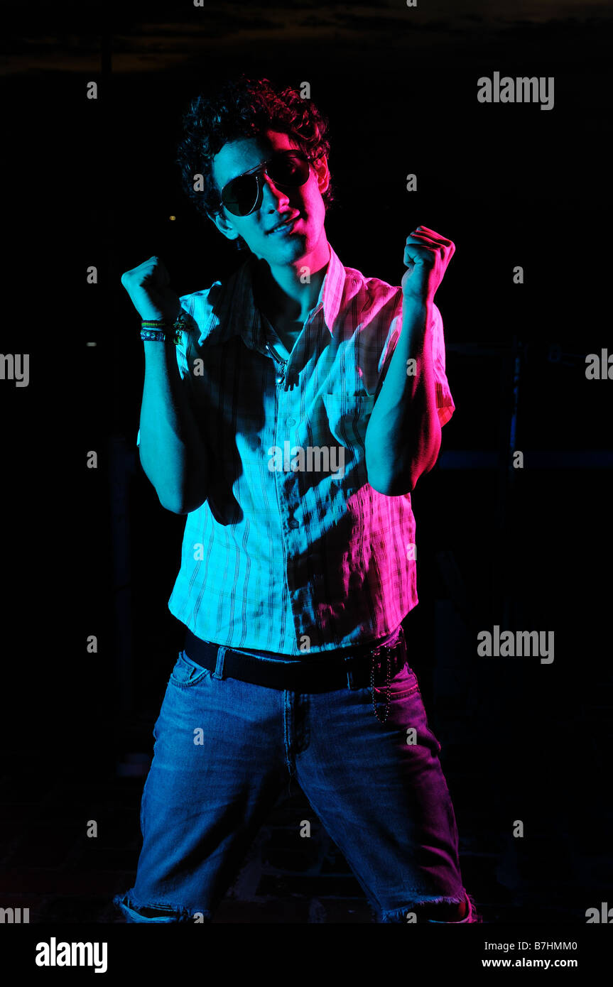 Portrait of young cool male model posing with attitude Stock Photo - Alamy