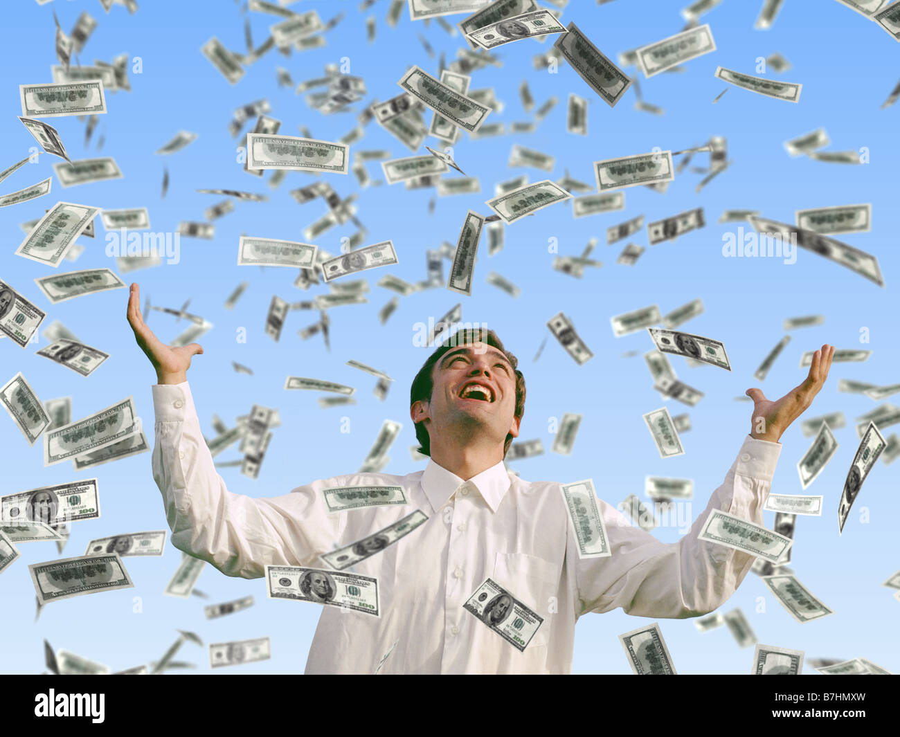 man catch a falling dollars Stock Photo - Alamy