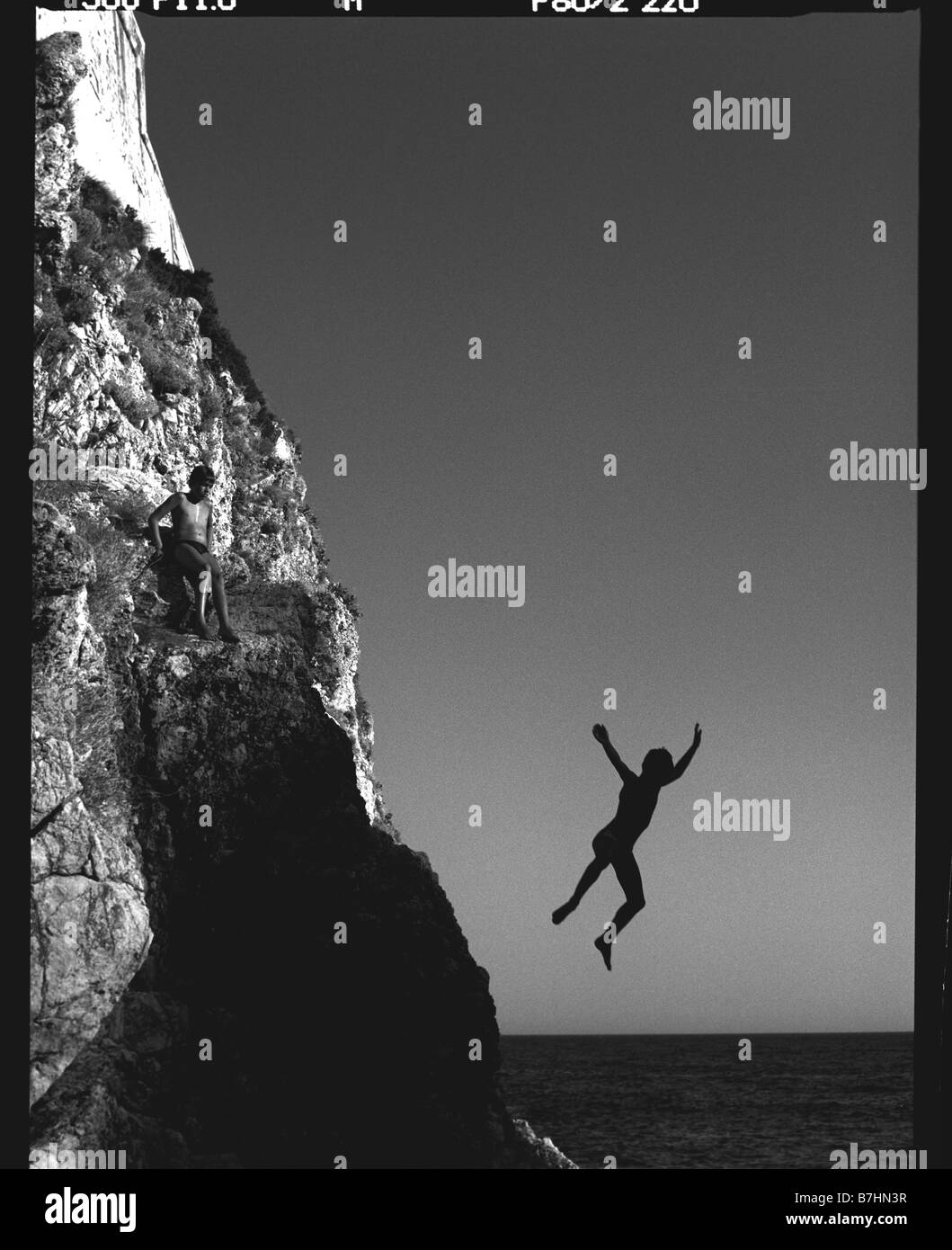 Cliff jumping in the Adriatic Stock Photo - Alamy