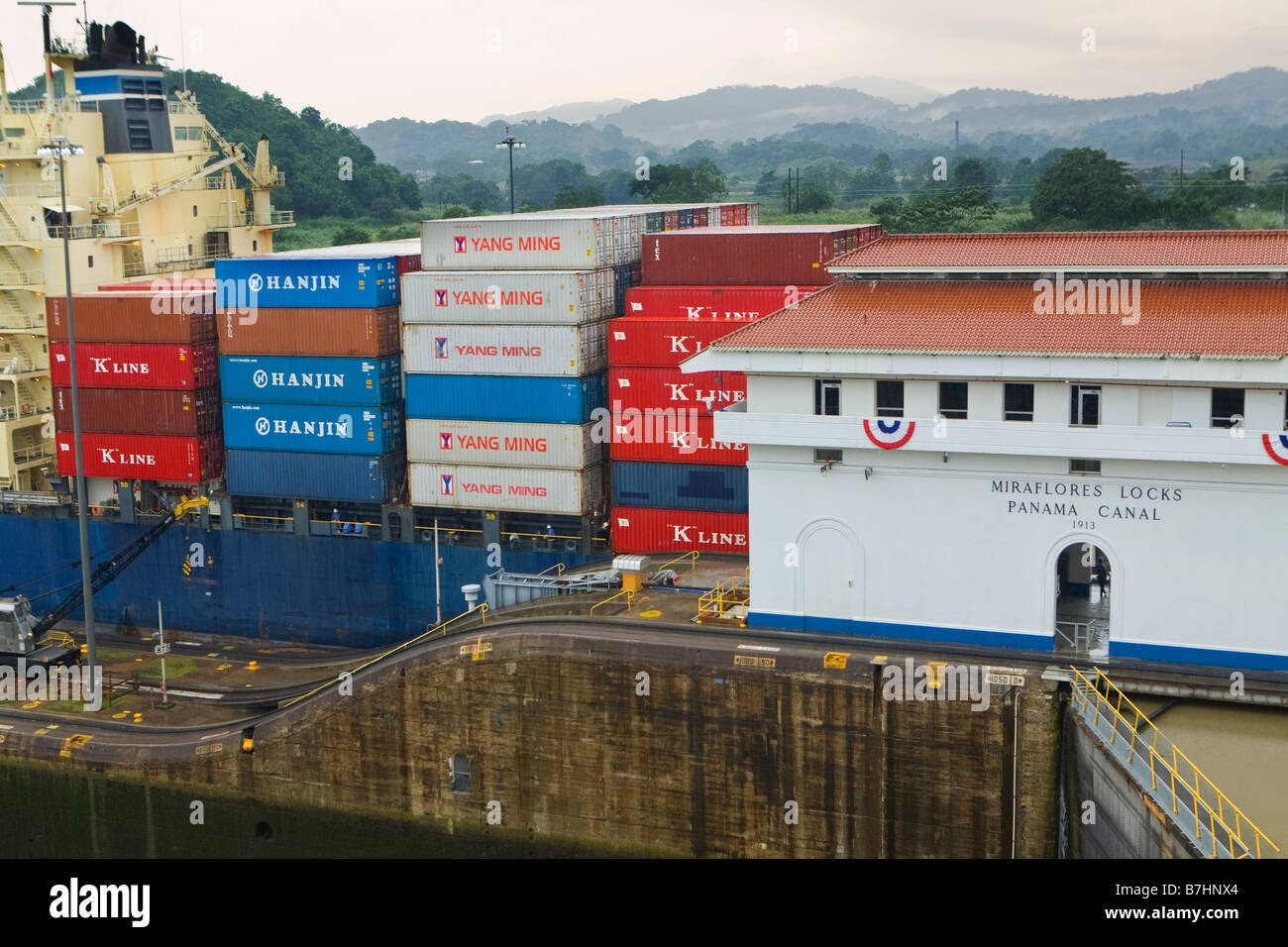 Large shipping boat going through the Miraflores Locks of the Panama ...